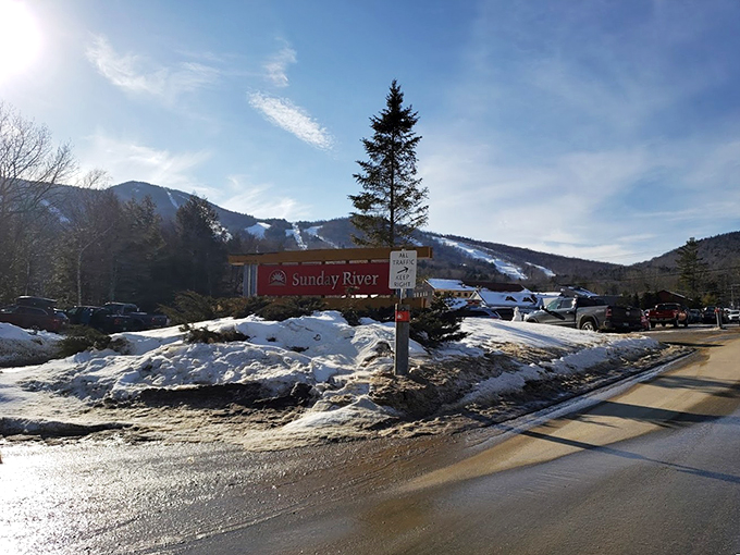 Winter wonderland or bustling basecamp? At Sunday River, it's both! This snowy scene promises adventure for skiers and snowboarders alike.