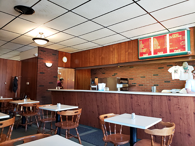 Wood paneling and classic booths - it's like dining in your cool grandpa's basement, but with better pizza!