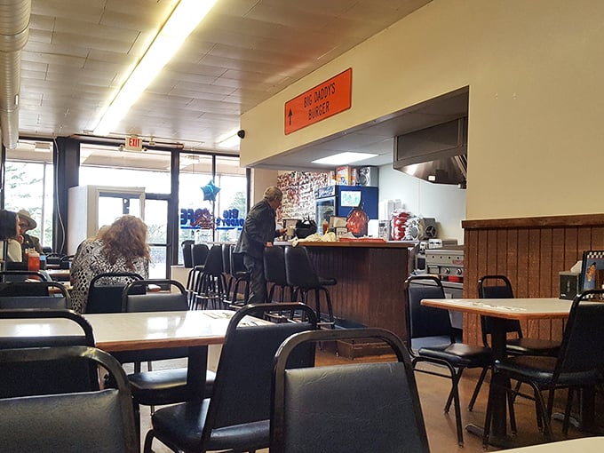 Step into a time capsule of comfort. This no-frills interior promises a feast for the belly, if not the eyes.