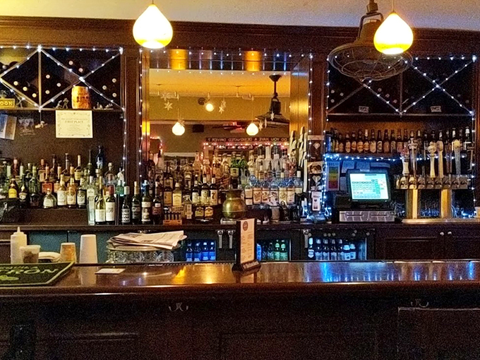 The well-stocked bar gleams with promise, its twinkling lights and vintage-style ceiling creating the perfect backdrop for evening revelry.