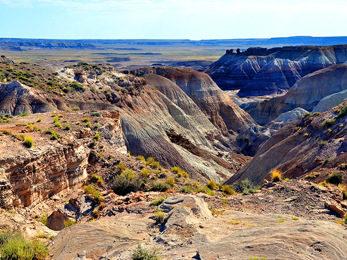 Nature's grand canvas unfolds before you. The Painted Desert's layered hues tell a story millions of years in the making. Photo credit: GMS1556