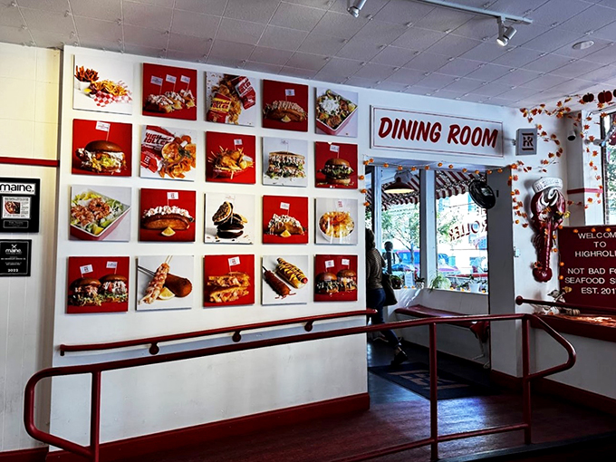 Food photos that could make a vegetarian reconsider life choices line the walls, while a "Dining Room" sign points the way to paradise.