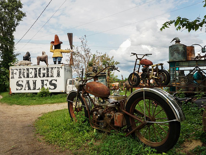 Rust never sleeps, but it sure knows how to party! This vintage motorcycle and eclectic signage set the tone for the treasure hunt that awaits inside.