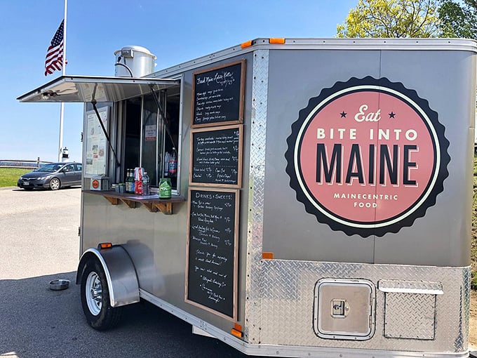 The American flag waves proudly above this mobile seafood sanctuary, where "Mainecentric" food isn't just a slogan&mdash;it's a delicious promise. Photo credit: @DaddyandCaleb