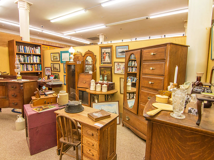 A perfectly curated corner vignette showcases vintage china, a numbered dresser, and enough charm to fill a Victorian parlor.