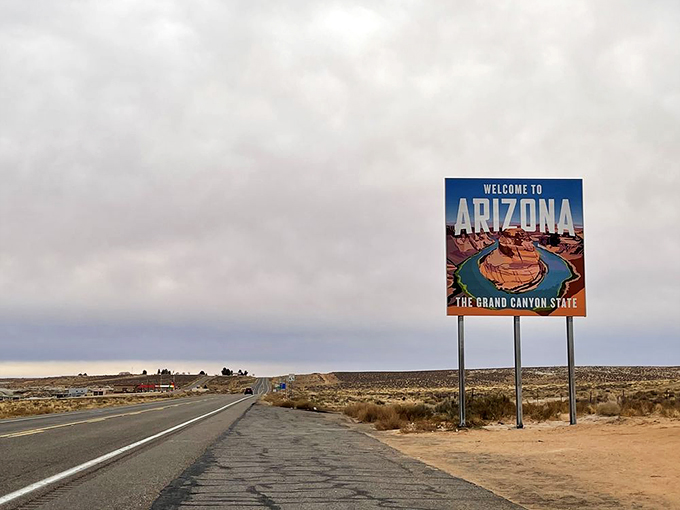 Who needs a red carpet when you've got this grand entrance? Arizona rolls out the welcome mat with style, showcasing its crown jewel right on the sign. Photo credit: Lane T.