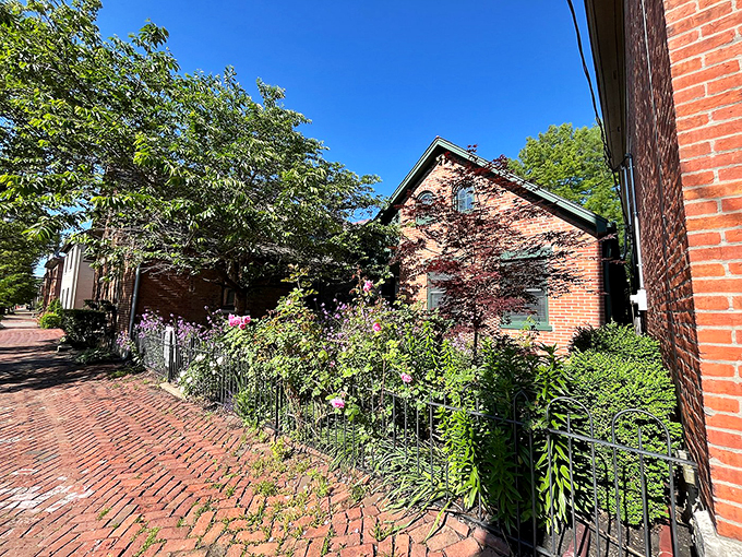 Brick by charming brick, this house whispers tales of yesteryear. It's not just a home; it's a storybook come to life, complete with a picturesque garden.