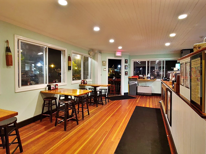 Warm wood tones and nautical charm create the perfect backdrop for seafood feasts, like dining in a ship captain's cozy quarters.