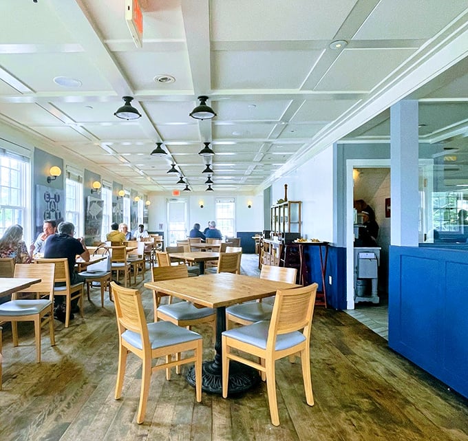 Clean lines, coastal elegance, and enough natural light to make photographers swoon. The dining room sets the perfect stage.