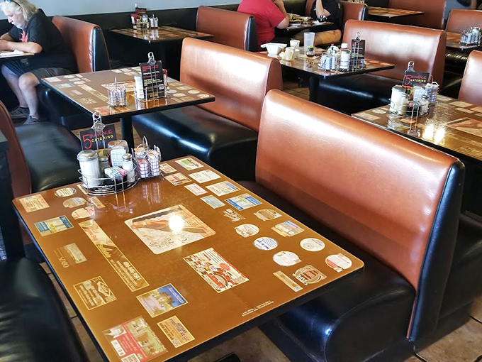 Cozy booths lined with vintage memorabilia create the perfect setting for both intimate conversations and solo morning contemplations. Photo credit: Matt Krick