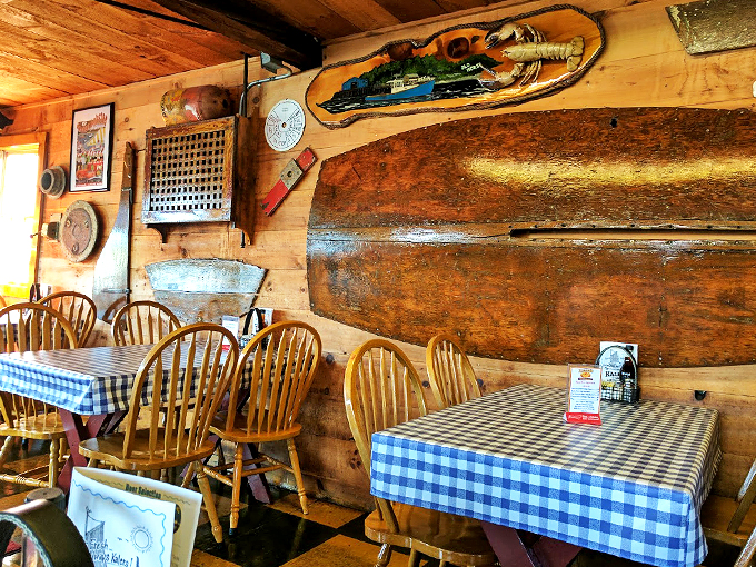 Blue-checkered tablecloths and weathered wood walls tell stories of countless seafood feasts and happy memories made here.