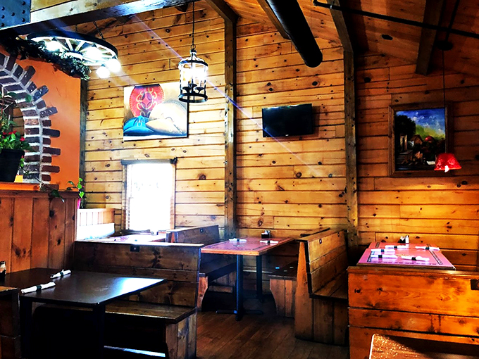 Rustic Maine meets vibrant Mexico in this cozy dining room, where wooden walls and festive decor create an unexpectedly perfect match.