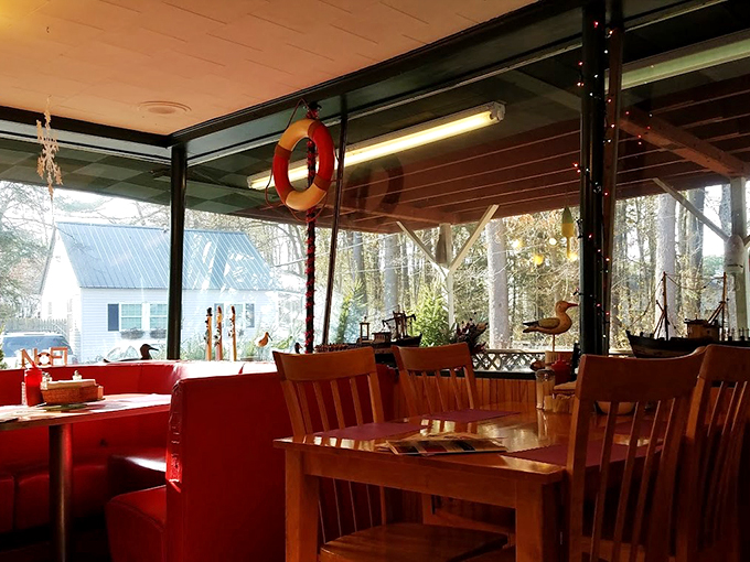 Red vinyl booths and nautical charm create the perfect backdrop for countless seafood feasts and family memories.
