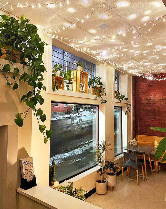 Twinkle lights and greenery create a cozy haven. It's like your cool plant-lady aunt opened a bakery &ndash; and nailed it.