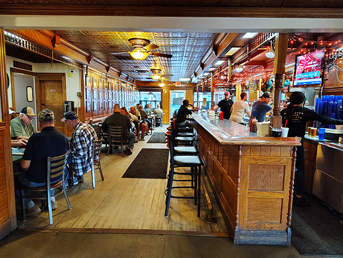 Step into a time capsule of Americana, where the wood paneling whispers tales of countless satisfying meals shared among friends.