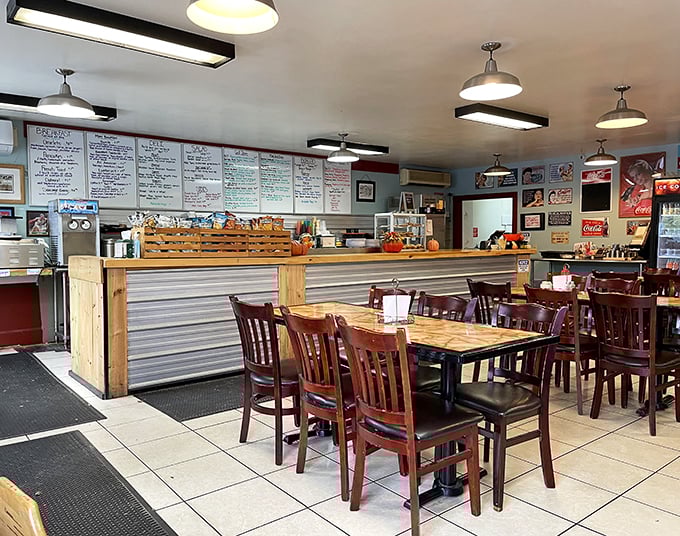 Retro meets comfort in this diner-style haven. The menu board's handwritten charm hints at the homemade goodness awaiting your taste buds.