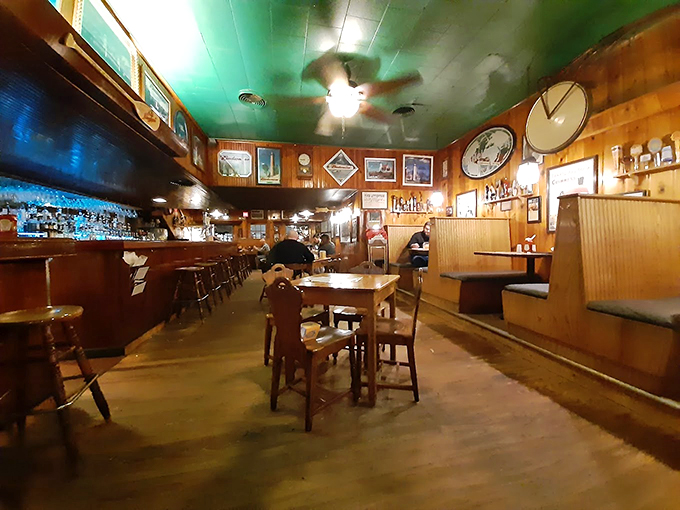 Wood-paneled walls and warm lighting create the kind of cozy atmosphere where memories are made and stories are shared.