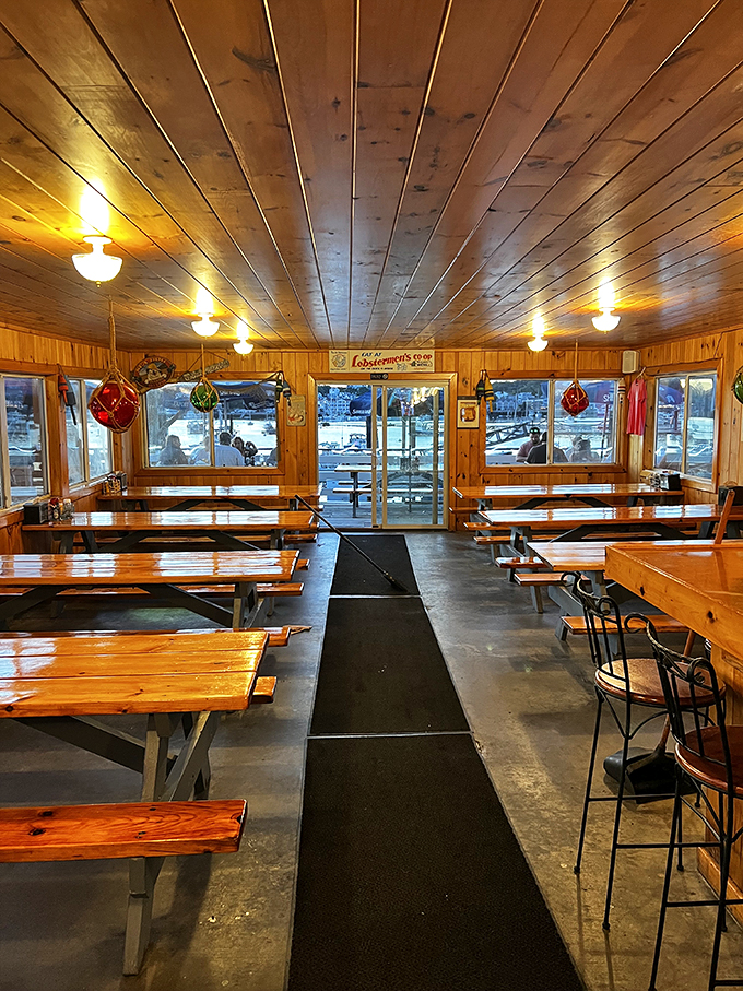 Step inside and feel the warmth of wood-paneled walls hugging you like a cozy fisherman's sweater. This isn't just a meal; it's a maritime embrace.