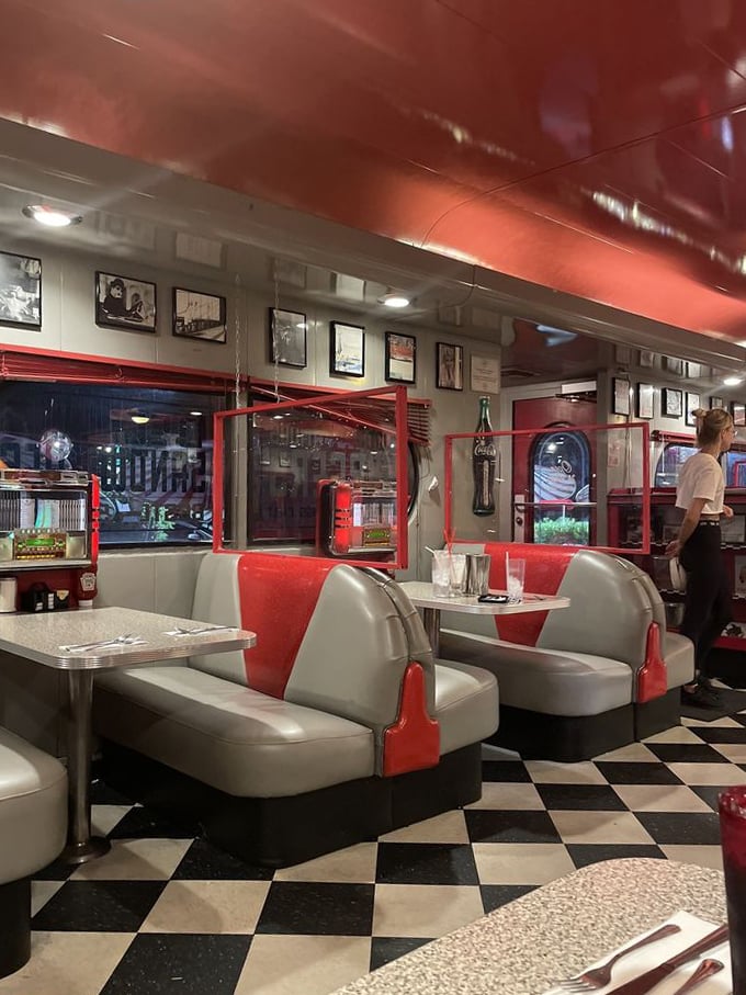 Red vinyl booths and checkerboard floors transport you back to when Elvis was king and milkshakes were a food group. Photo credit: April A.
