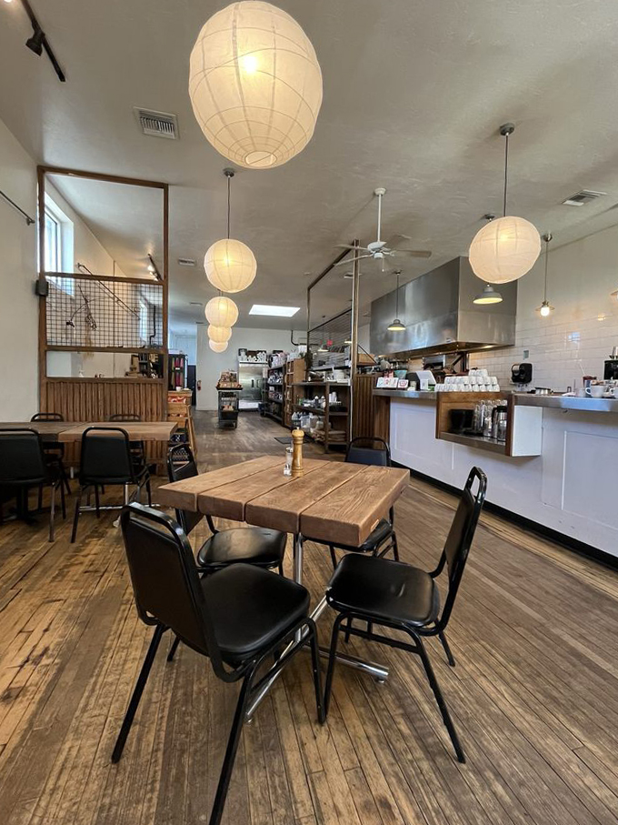 Paper lanterns float like morning clouds above rustic wooden tables, creating a zen-like atmosphere that whispers "stay awhile." Photo credit: Jessica D.