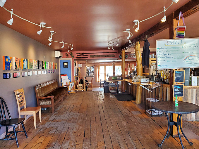 Step inside and feel the cozy vibes wash over you. It's like your coolest friend's living room, if that friend was really into coffee and local art.