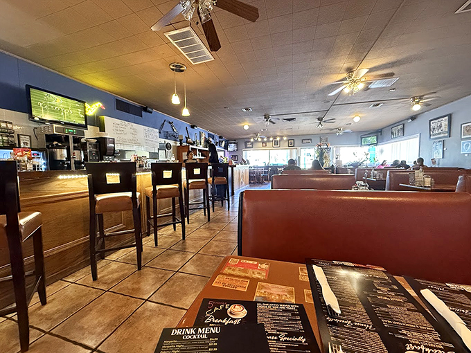 Warm lighting, cozy booths, and jazz memorabilia create the perfect backdrop for your morning symphony of eggs and coffee. Photo credit: Skipper Janczewski