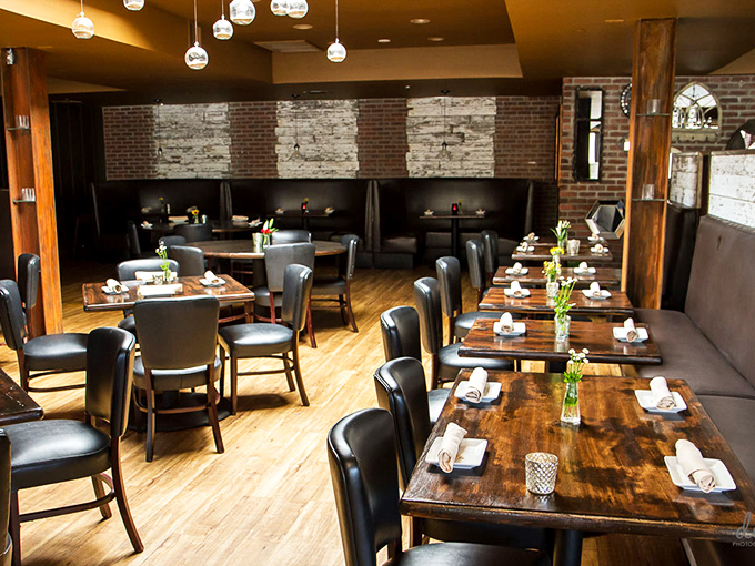 Step inside and prepare for a feast for the senses. The exposed brick and warm wood create an atmosphere that's part rustic Tuscan villa, part trendy hotspot &ndash; molto bene! Photo credit: EVO Old Town Scottsdale