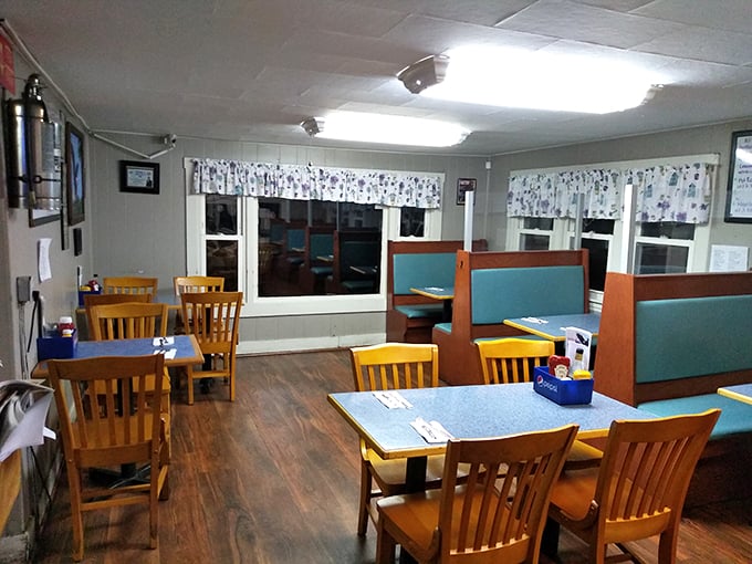 Step into a time capsule of comfort! This cozy dining room feels like grandma's house, if grandma was a seafood-slinging culinary genius.