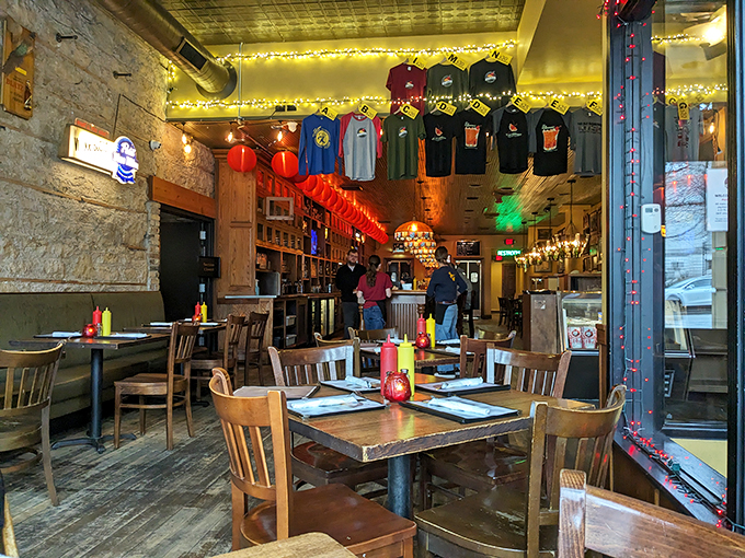 Step into a time capsule of Midwest hospitality. T-shirts dangle overhead like edible memories waiting to be savored.