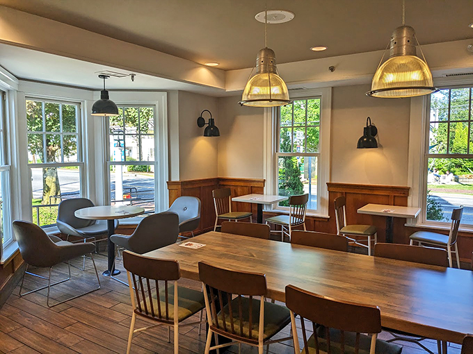 Warm wood wainscoting and elegant pendant lights create an atmosphere that's more like a country inn than a quick-service restaurant. Who knew value meals could be so refined? Photo credit: Michael L