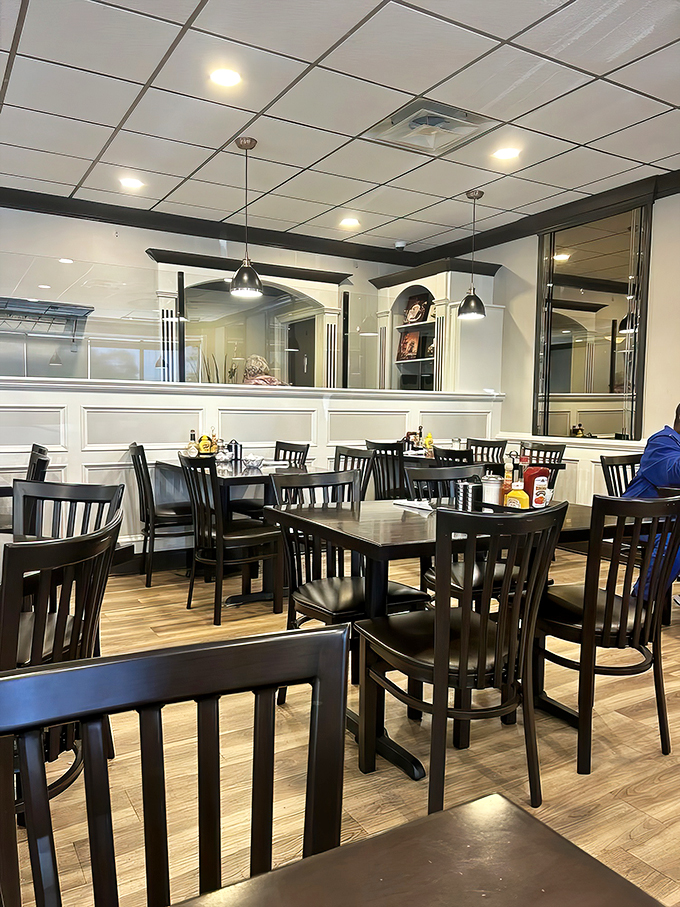 Step into a world where comfort meets style. This dining room is like your cool aunt's house &ndash; if she were a breakfast wizard.