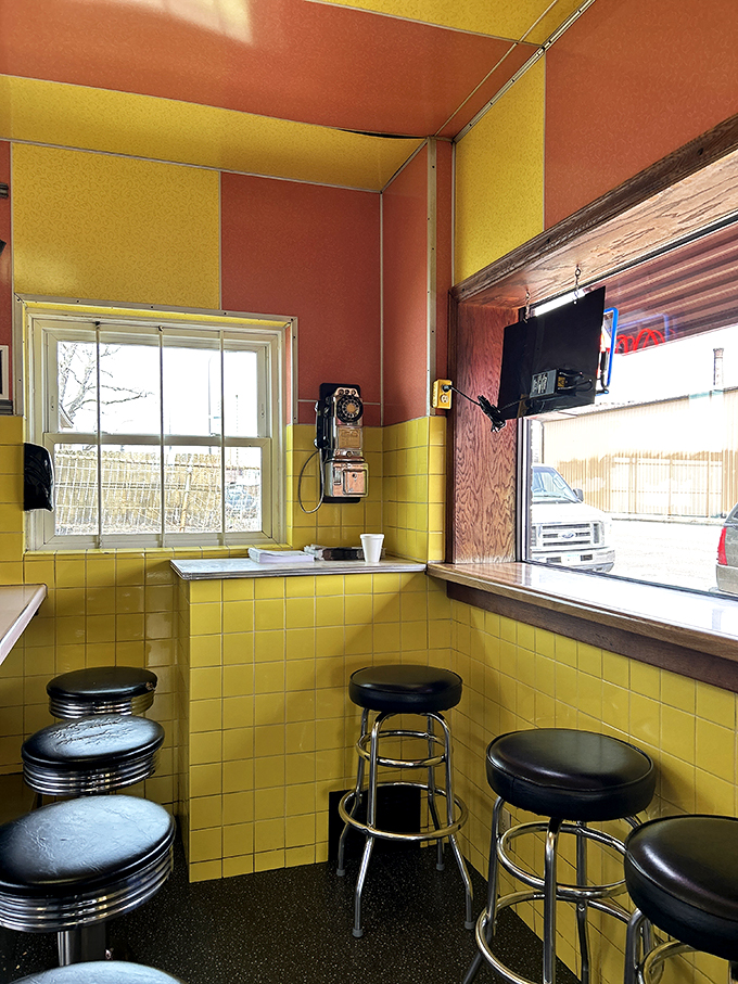 Sunny-side up decor! These cheerful yellow tiles could brighten even the gloomiest Minnesota morning. It's like eating inside a ray of sunshine!