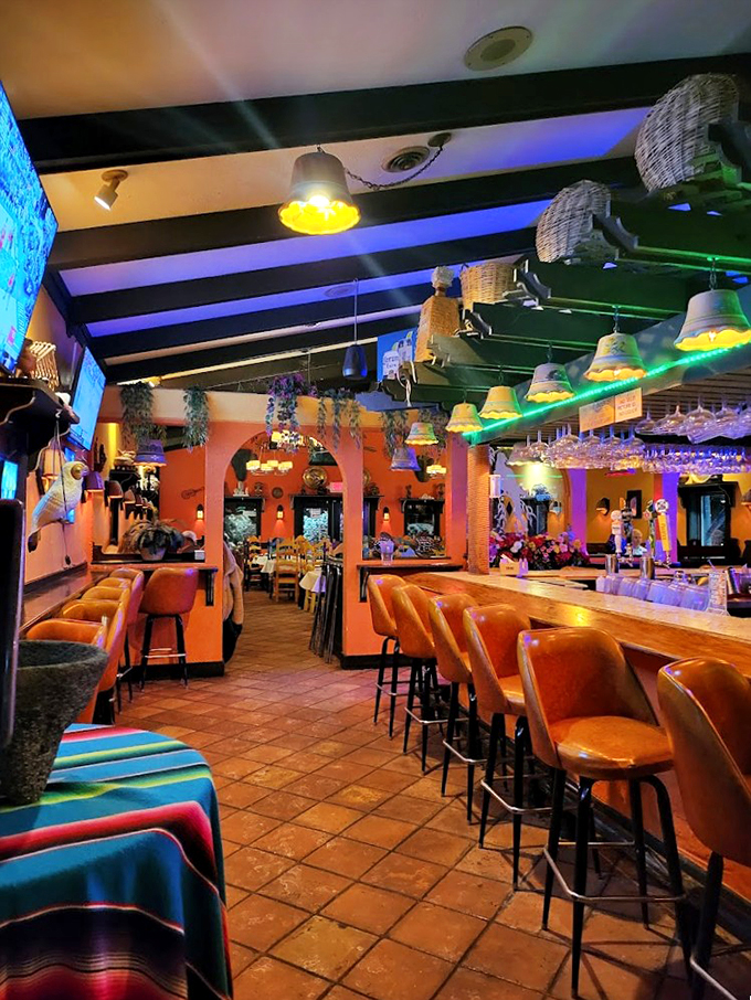 Warm orange walls and exposed brick archways transport you straight to a cozy cantina in Mexico City.