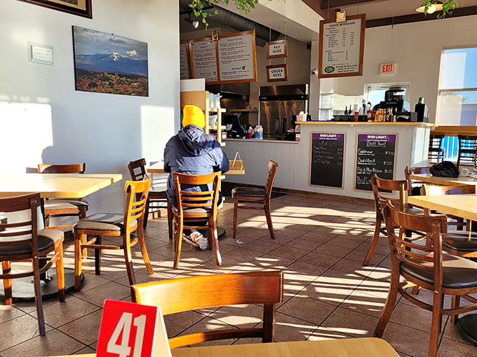 Step inside and feel the warmth! This cozy interior is where comfort food dreams come true and diet plans go to die.