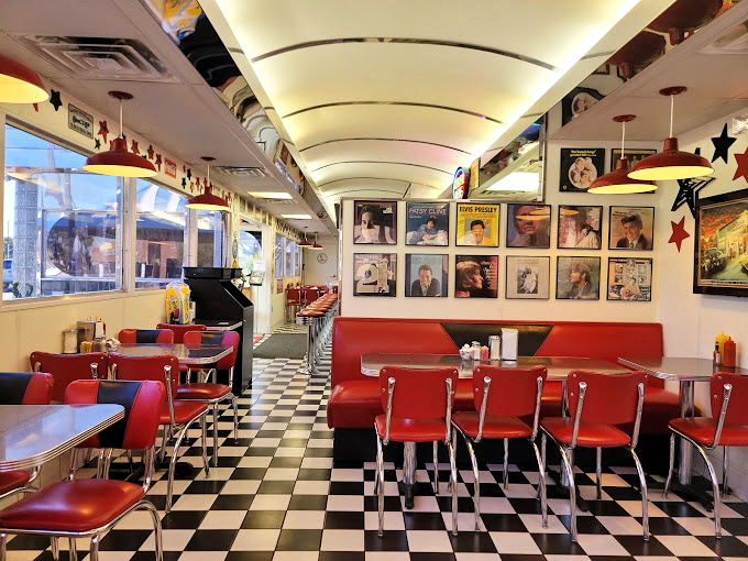 Red vinyl booths and checkerboard floors create the perfect backdrop for your own personal episode of Happy Days.