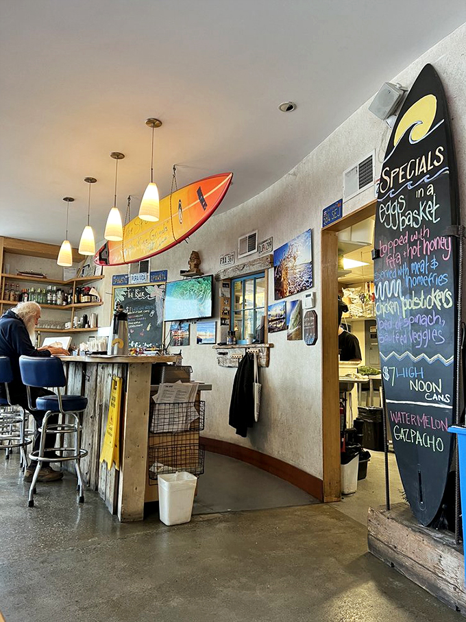 Step into a world where surfboards hang from ceilings and chalkboards promise culinary adventures. It's like Endless Summer met a cozy Vermont cabin and decided to serve breakfast!