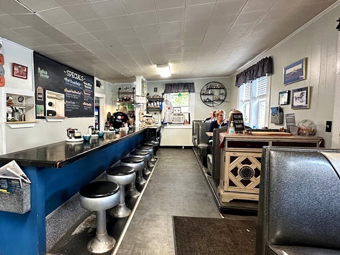 Classic chrome stools line a counter that's seen more morning conversations than a coffee pot at the local post office.