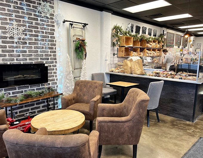 Cozy armchairs, exposed brick, and twinkling lights create the perfect spot to contemplate life's greatest question: one more pastry or two?