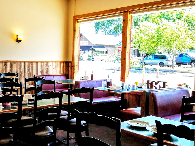 Step into a cozy time machine! With its wood paneling and purple booths, Berry Sweet Kitchen feels like your favorite aunt's living room – if your aunt was a culinary genius.