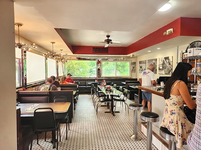 Step inside and let the retro charm wash over you. With its cozy booths and counter seating, Bob's interior feels like a warm hug from your favorite aunt – if your aunt could cook like a short-order wizard.