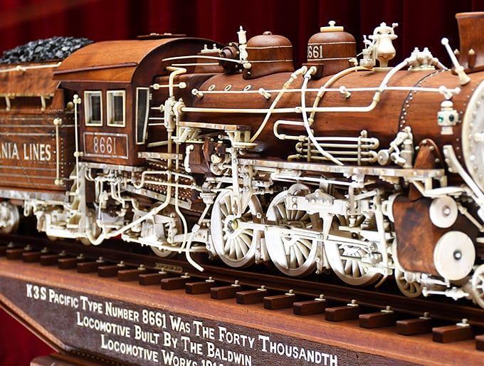 All aboard the detail express! This intricate wooden locomotive is so lifelike, you can almost hear the whistle blow.
