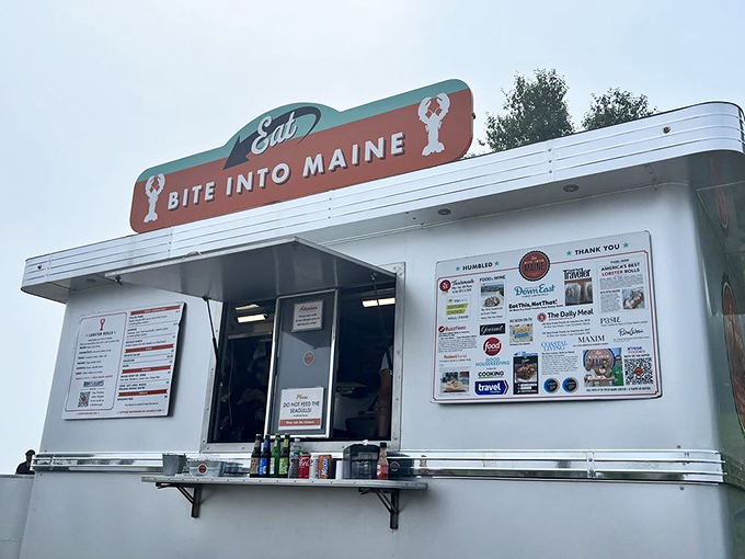 The menu board tells tales of lobster adventures to come, while press accolades hint at the treasures that await hungry visitors. Photo credit: Sue S.