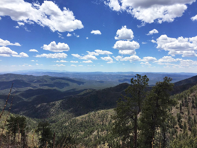 Nature's amphitheater unfolds with layers of mountains fading into the horizon, each ridge telling its own geological story.