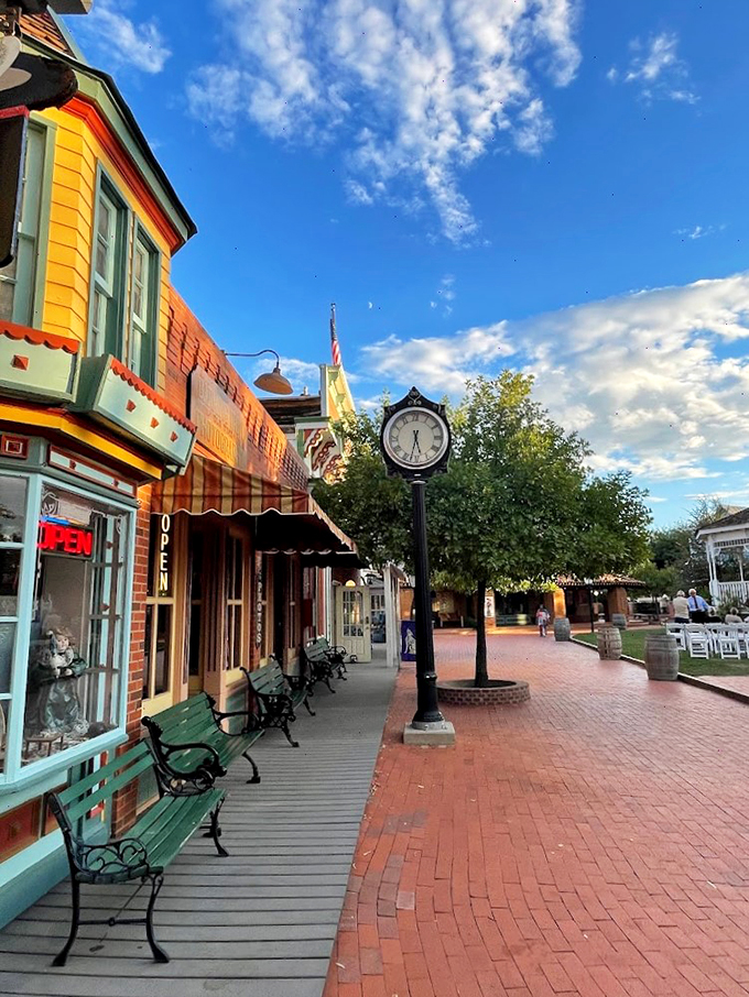 Colorful storefronts and wooden boardwalks transport visitors back in time, while vintage lampposts cast a warm glow at dusk.