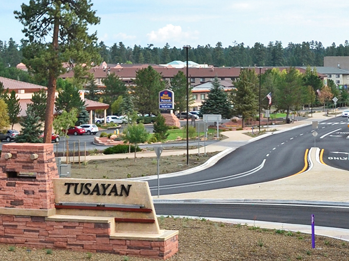 Welcome to Tusayan - four words that promise adventure. This sign marks the gateway to Grand Canyon country, where every turn is a photo op.