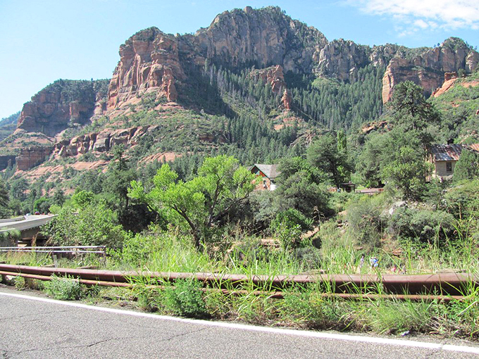 Sedona's iconic red rocks stand sentinel over SR 89A, nature's own welcome committee greeting every passing traveler.