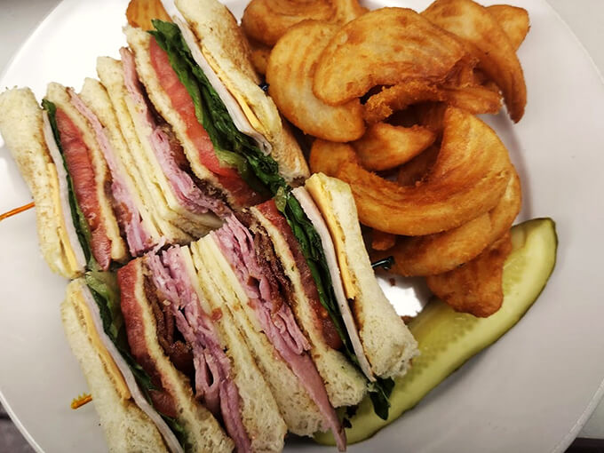 Behold, the Leaning Tower of Deliciousness! This club sandwich is stacked higher than my pile of unwatched Netflix shows.