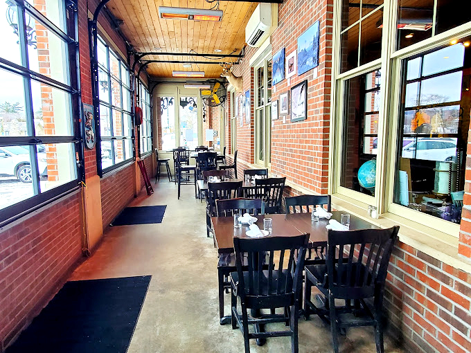 Cozy up in Cafe Sant&eacute;'s dining room, where the ambiance is warmer than a French grandmother's embrace. It's where comfort meets culinary adventure!