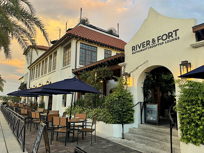 Sunset or showtime? River & Fort's entrance is ready for its close-up. The warm glow promises an evening of gastronomic adventures and rooftop revelations.