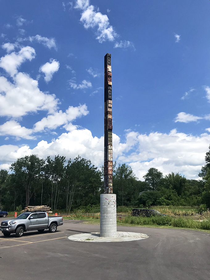 Who knew bureaucracy could be so eye-catching? This metallic marvel stretches skyward, a testament to creativity and perhaps a touch of madness.